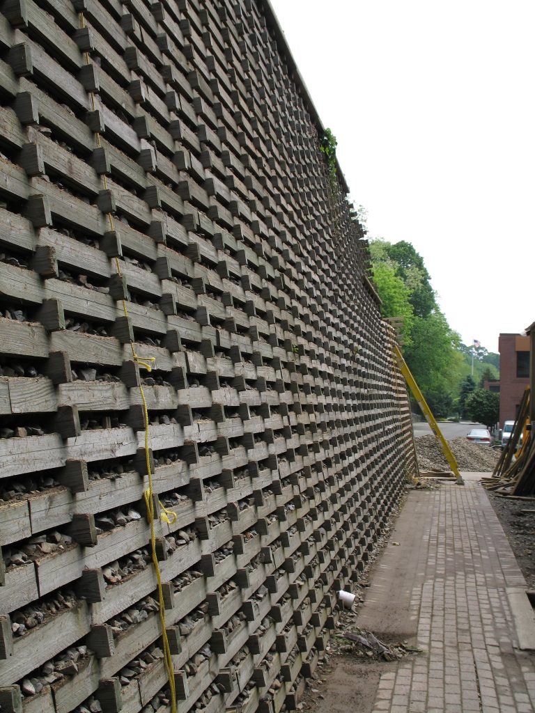A large green retaining wall · Chris Dyson-Coope ....... Kansas City ...